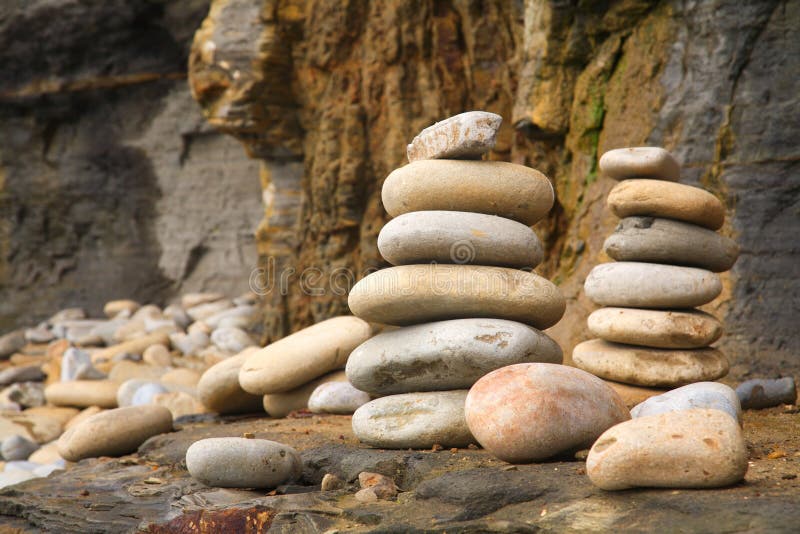 Rock stacks on the beach stock photo. Image of pile - 247256186