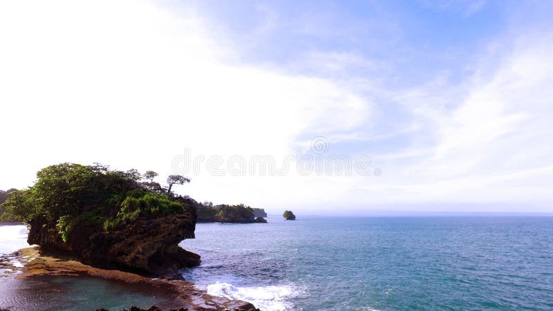 Sturdy Rock Stands Beautiful Beach Stock Photos - Free & Royalty-Free ...
