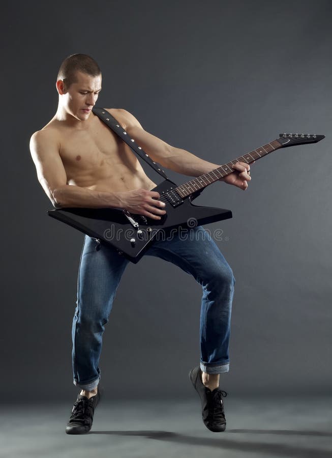 Rock Star Playing the Guitar Stock Image - Image of loud, entertainment ...