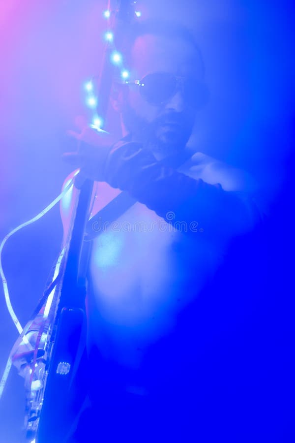 Rock Star Playing Solo on Guitar, Neon Lights Stock Photo - Image of ...