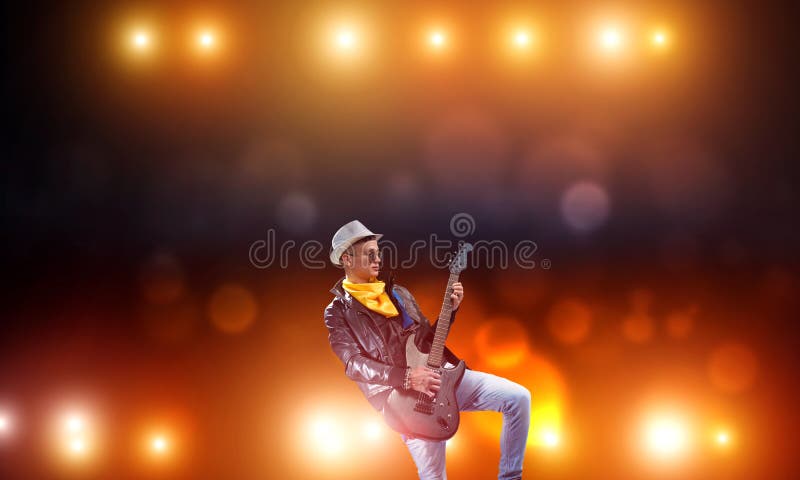 Rock star on stage stock image. Image of rocker, jeans - 259577985