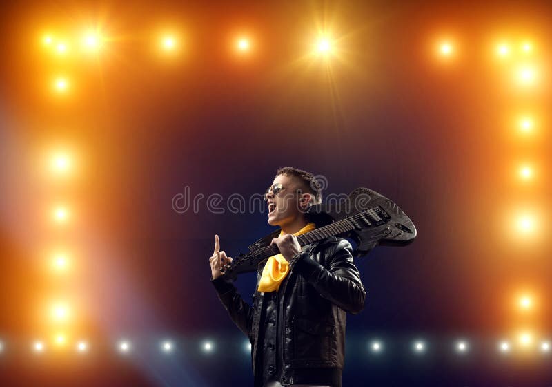 Rock star on stage stock image. Image of performer, performance - 76354789