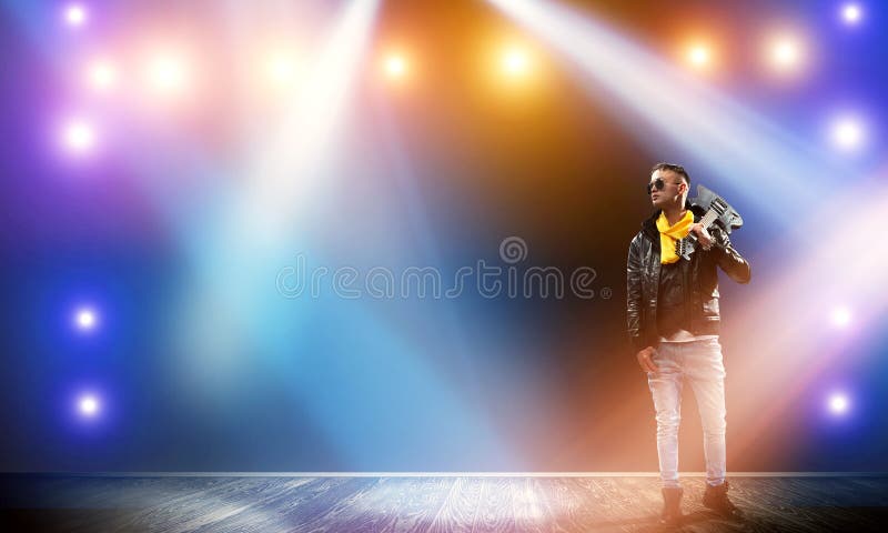 Rock star on stage stock photo. Image of fame, entertainment - 76472012