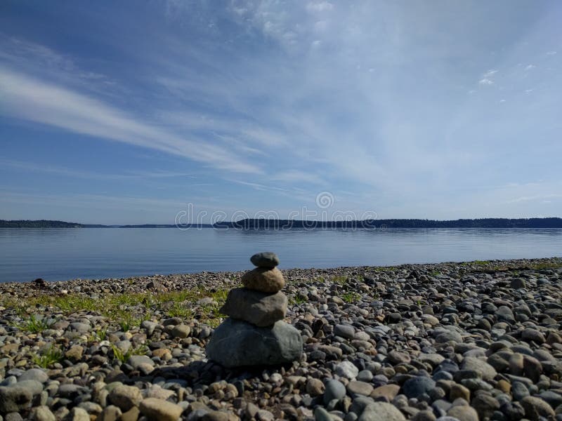 Rock statue on beach stock image. Image of stacked, form - 117159591