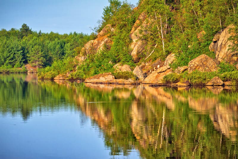 Rock structure and a lake stock image. Image of destination - 43576625