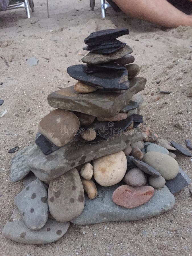 Rock tower on the beach stock image. Image of beach, flat - 92272733