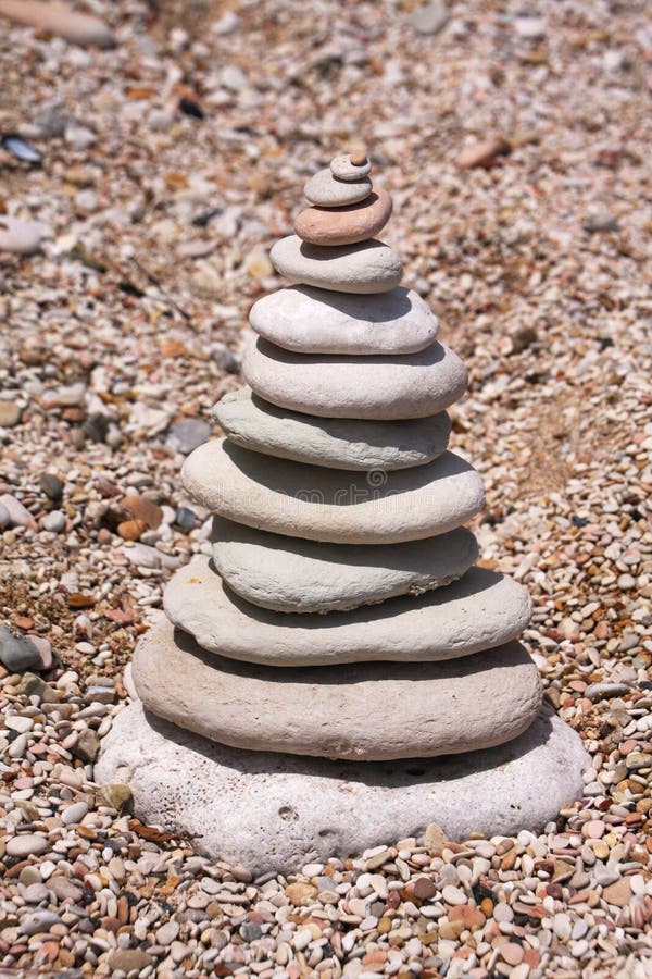 Rock Tower on a Natural Rock Formation Against an Ocean Background and ...