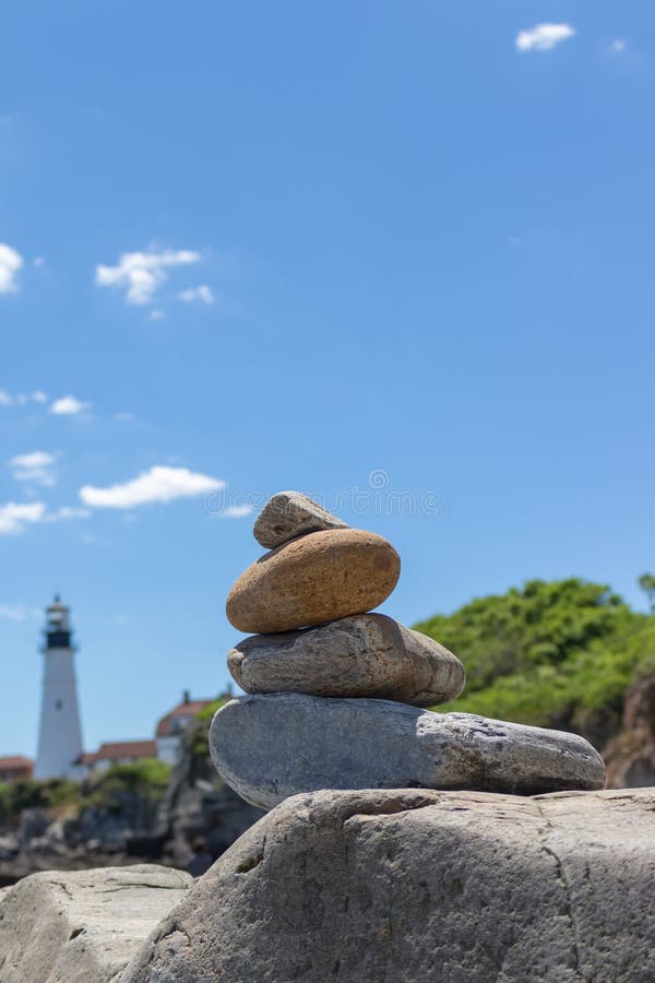 Rock Tower and Lighthouse on a Rock Coast Stock Photo - Image of ...