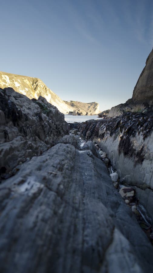 Rock Tunnel stock photo. Image of sunset, coast, rock - 29103646