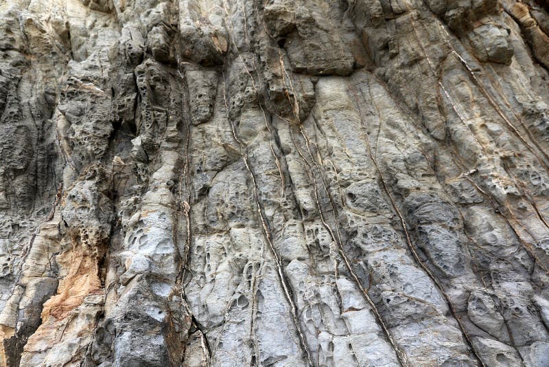 Rock with Vertical Mineral Lines Stock Photo - Image of rock, hard ...