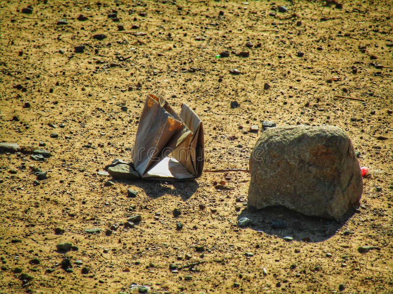 Rock vs paper stock photo. Image of rock, brown, sand - 150797848