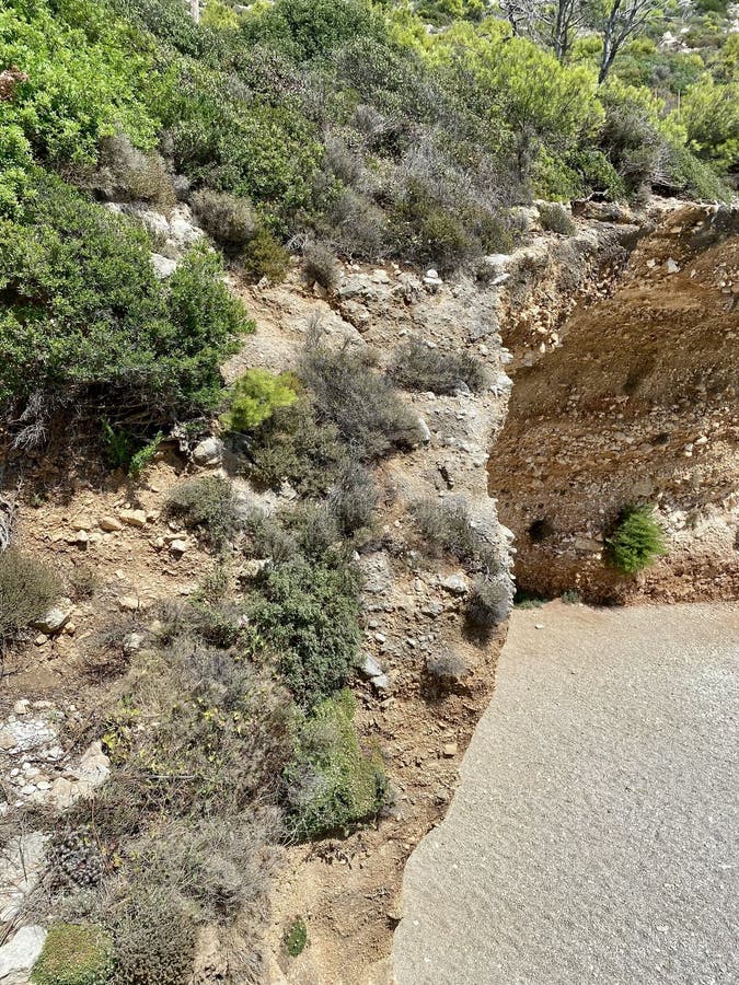 Rock wall on the beach. stock photo. Image of nature - 243650544