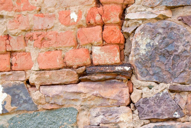Rock Wall Fixed With Bricks Stock Photo - Image of natural, wall: 13121992