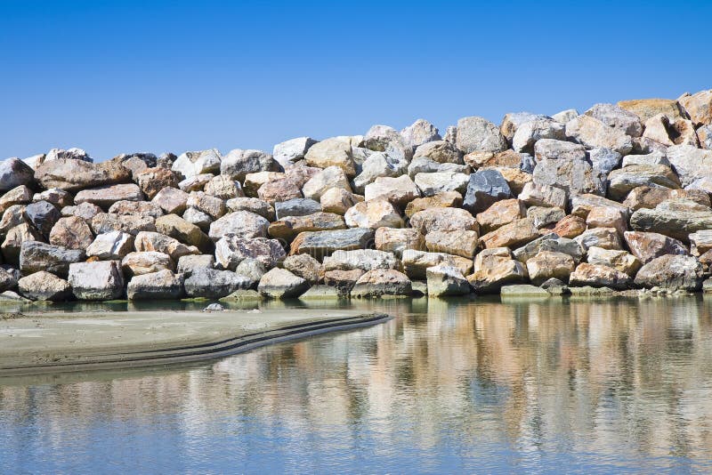 Rock Wall Protection from the Waves - Concept Image Stock Image - Image ...