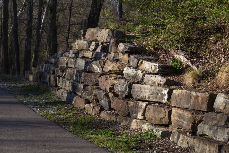 Rock wall stock photo. Image of forest, park, rock, trees - 256022532