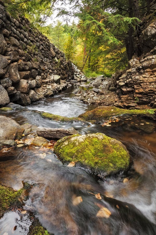 Rock Wall and Stream stock photo. Image of cascade, landscape - 82606968