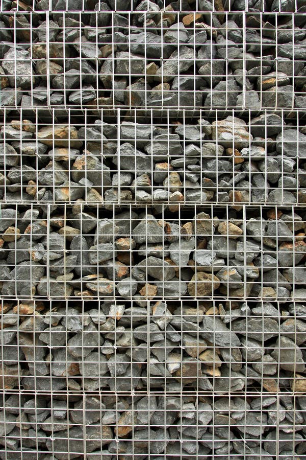 Rock wall with wire stock photo. Image of wall, pebble - 28425798