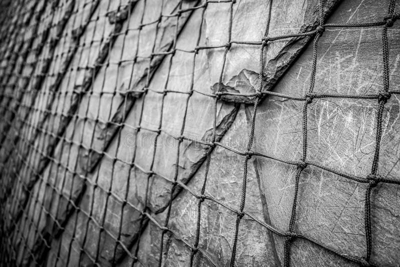 Rock wall with wire stock image. Image of cold, wall - 50390349