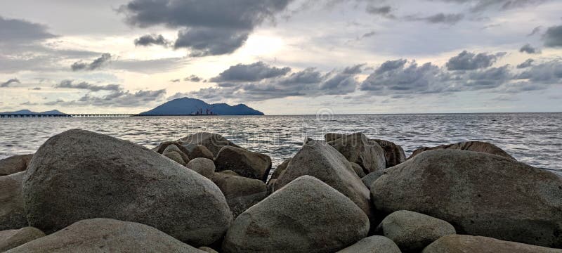 Rock on Water stock photo. Image of ocean, terrain, wave - 222716496