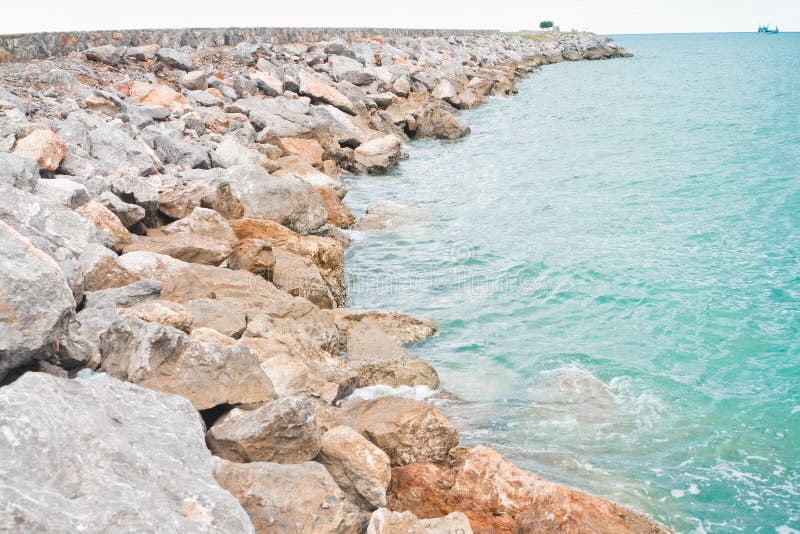 Rock wave barrier stock image. Image of horizon, barrier - 229135537