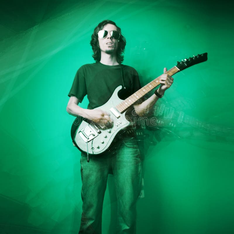 Man Playing Electric Guitar Over Green Background Zoom Stock Photos ...