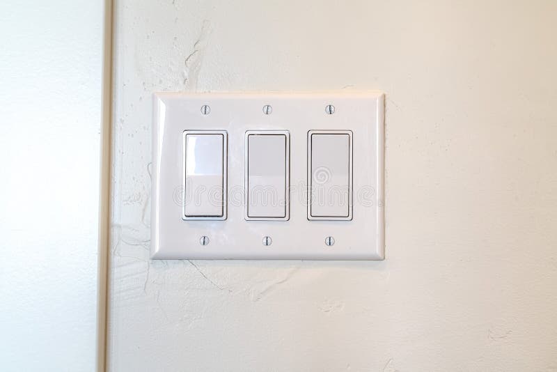 Rocker Light Switch with Multiple Flat Broad Lever Mounted on the ...