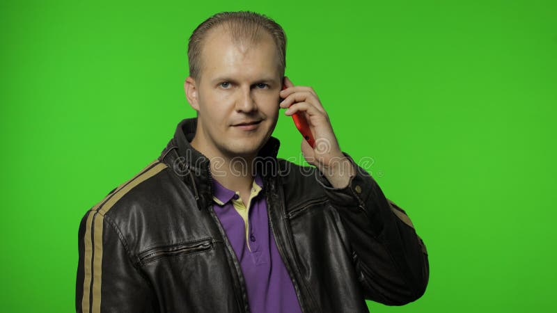 Rocker Man Calling Friend, Talking on Mobile Phone with Proud ...