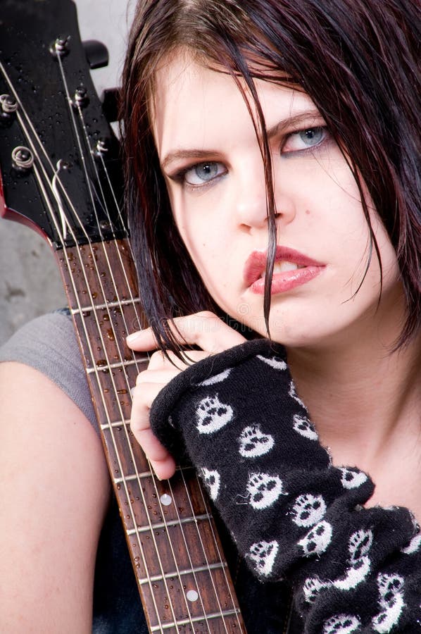 Rocker in the Rain stock photo. Image of electric, belt - 5088754