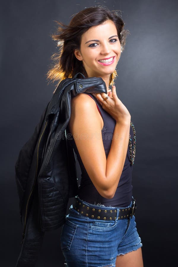 Rocker s smile stock photo. Image of brunette, jeans - 45840280