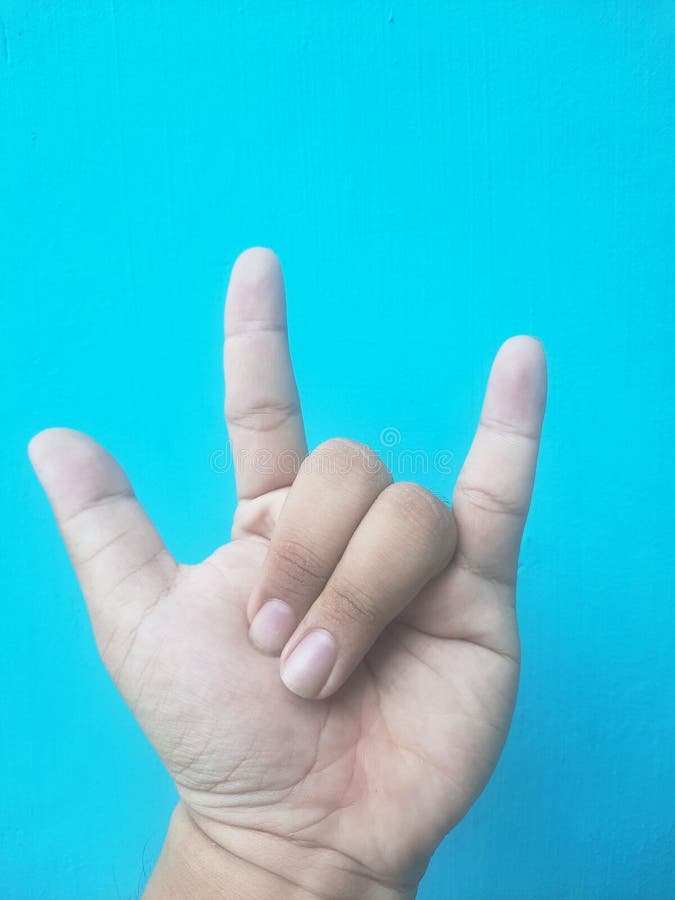 Rocker symbol using hands. stock photo. Image of young - 333763804