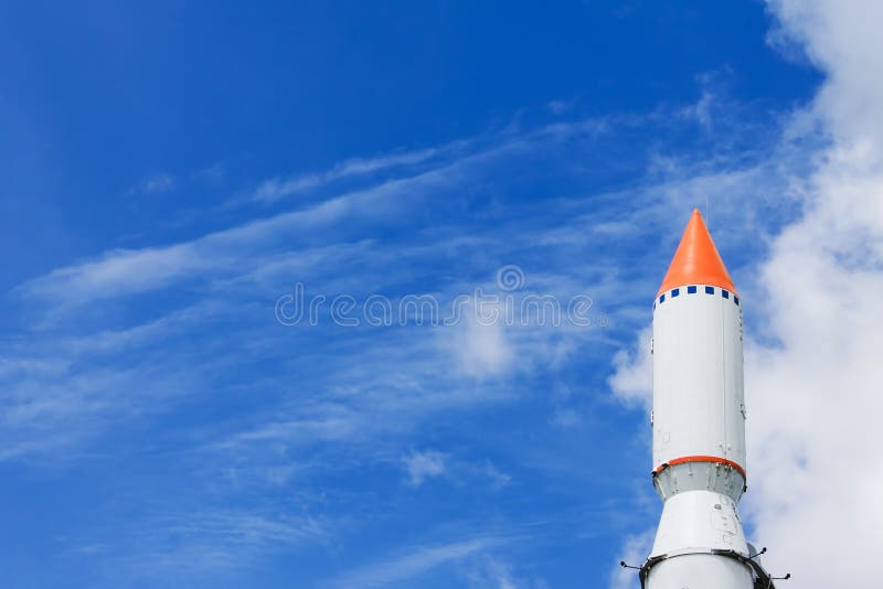 Rocket in the Blue Sky with Clouds Stock Photo - Image of satellite ...
