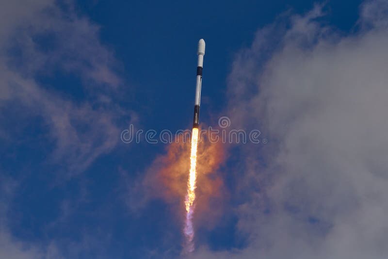 Rocket Flying in the Night Sky with White Clouds Stock Photo - Image of ...