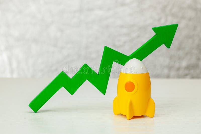 Rocket and Green Up Arrow on Gray Background Stock Photo - Image of ...