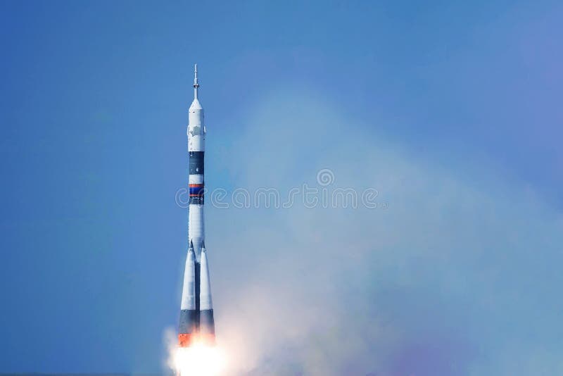Rocket Launch into Space. Elements of this Image Furnished by NASA ...