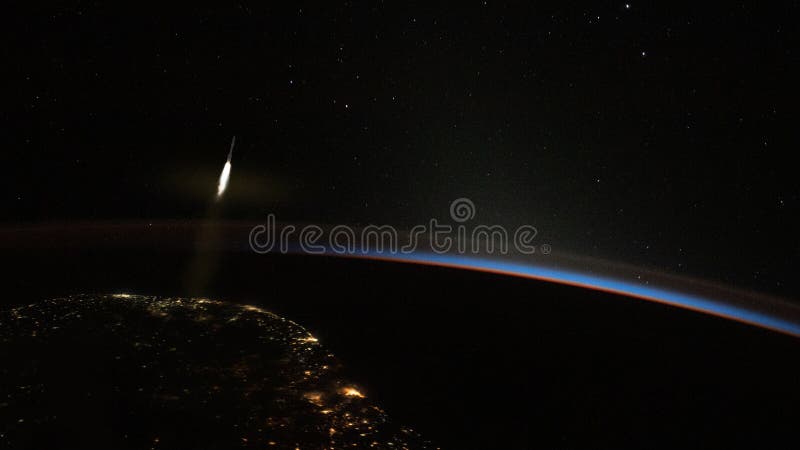 The Rocket Takes Off from the Earth into Space. the Planet is Dark and ...