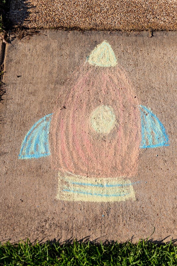 Rocket Ship Art Drawn with Sidewalk Chalk Stock Image - Image of ...