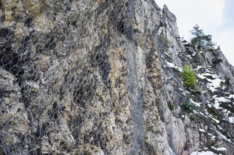 Rockfall protection nets stock photo. Image of access - 163992670