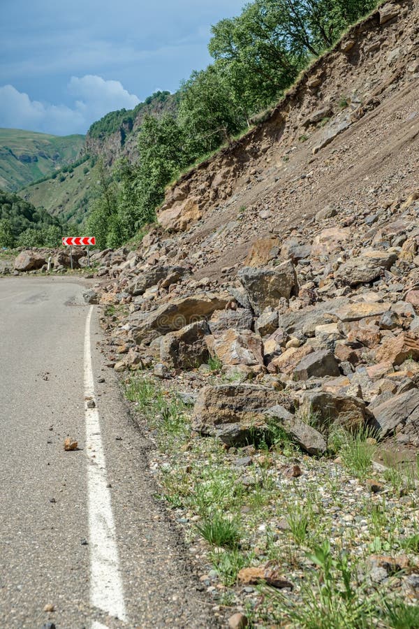 Rockfall on the Road in the Mountains. Stock Photo - Image of caution ...