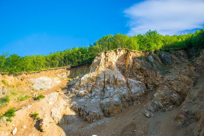 Rockfall on a steep slope stock photo. Image of landscape - 98532910