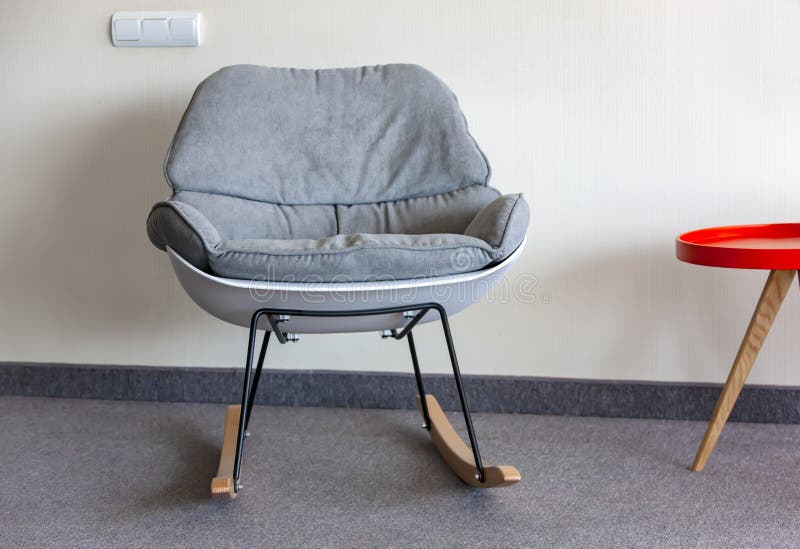 Rocking Chair and Table Against the Wall. Interior Inside Stock Image ...