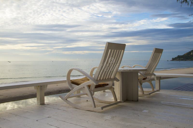 Rocking Chair on the beach stock photo. Image of color - 31763766