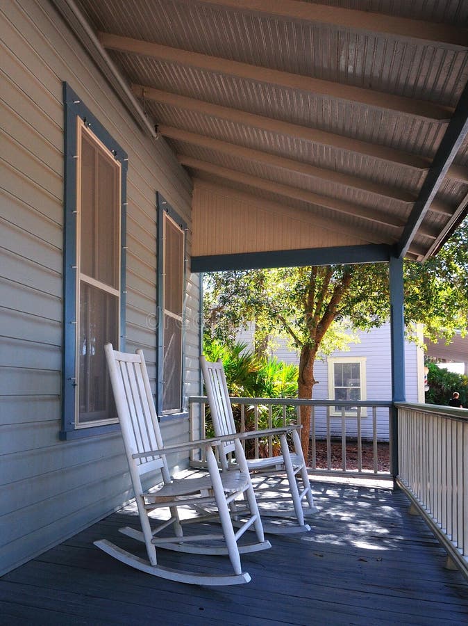 Rocking chairs on a porch stock image. Image of porch - 18051507