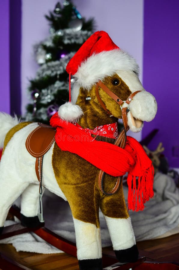 Rocking horse at Christmas stock image. Image of back - 63389713