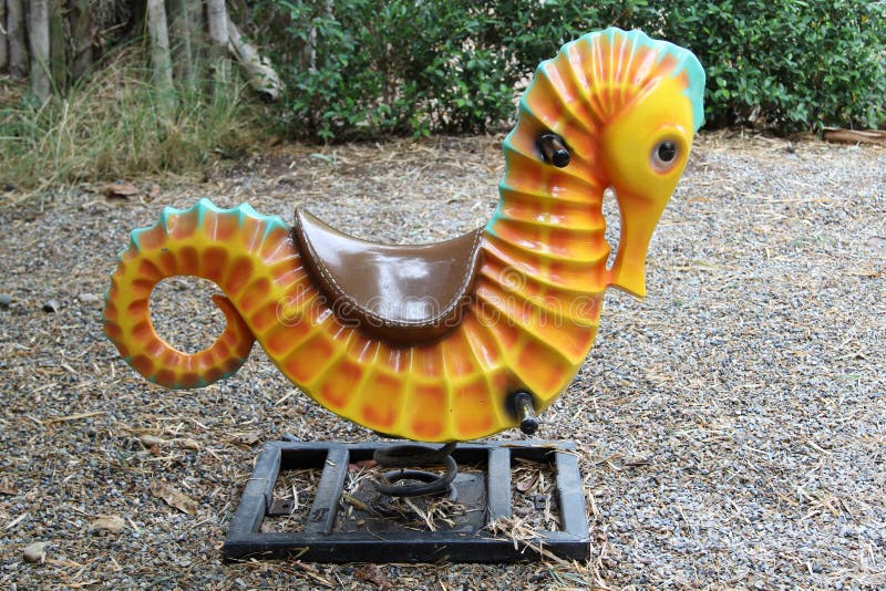 Rocking horse in the park stock image. Image of seat - 162313681