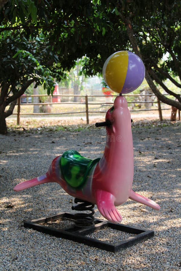 Rocking horse in the park stock photo. Image of horse - 162313652