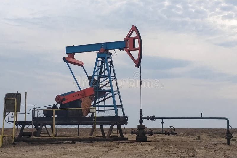 Rocking Machine on an Oil Well. Oil Production Stock Image - Image of ...