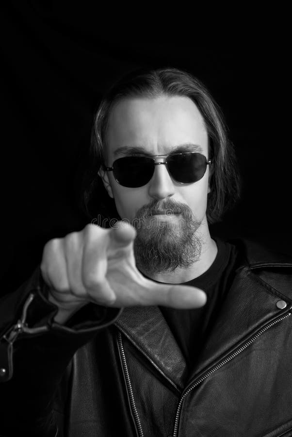 Rockman Pointing To the Viewer Stock Image - Image of glasses, leather ...