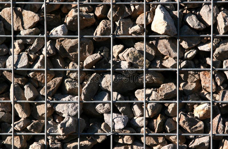 Rocks stock image. Image of contained, stones, caged, retained - 1483317