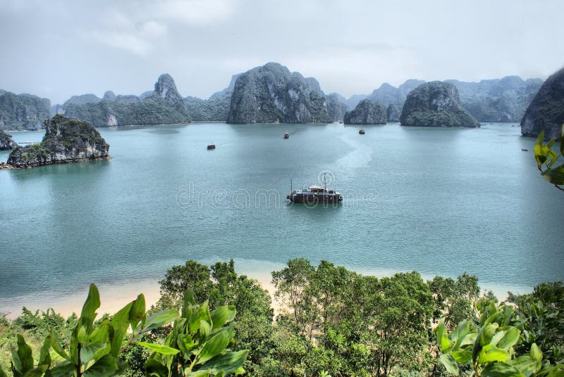 Rocks around the flat sea stock photo. Image of asia - 18942130