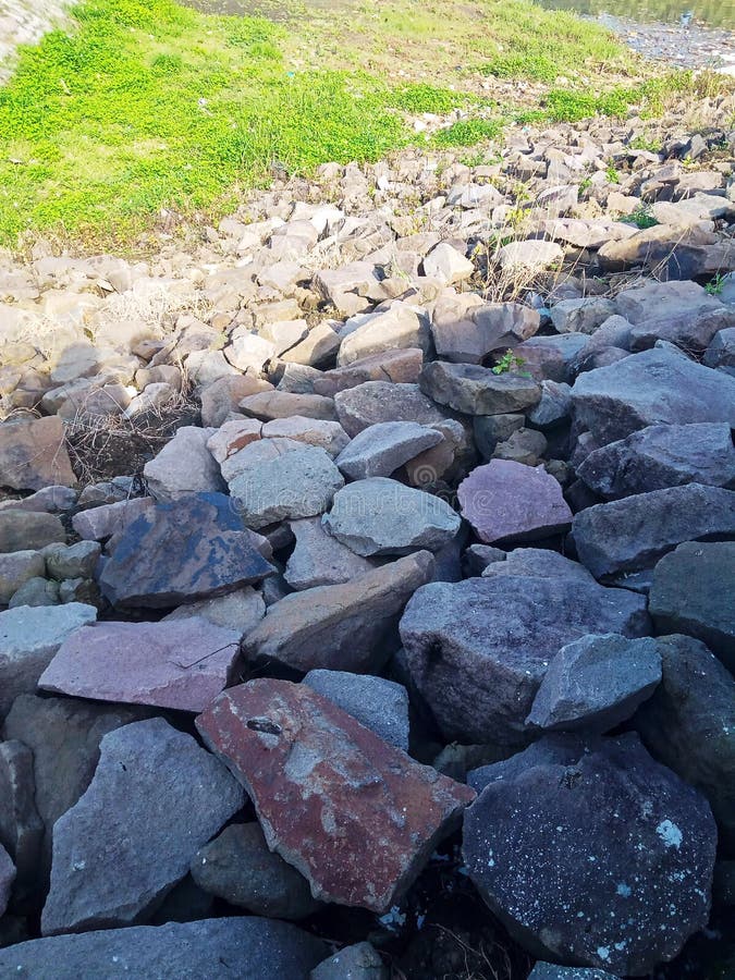 Rocks Arranged on the Side of a Road Stock Photo - Image of floor ...